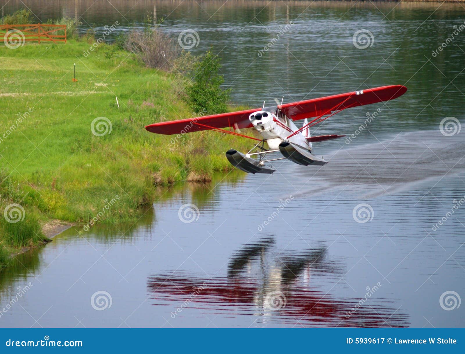 Float Plane Taking Off stock image. Image of waves, fencing - 5939617