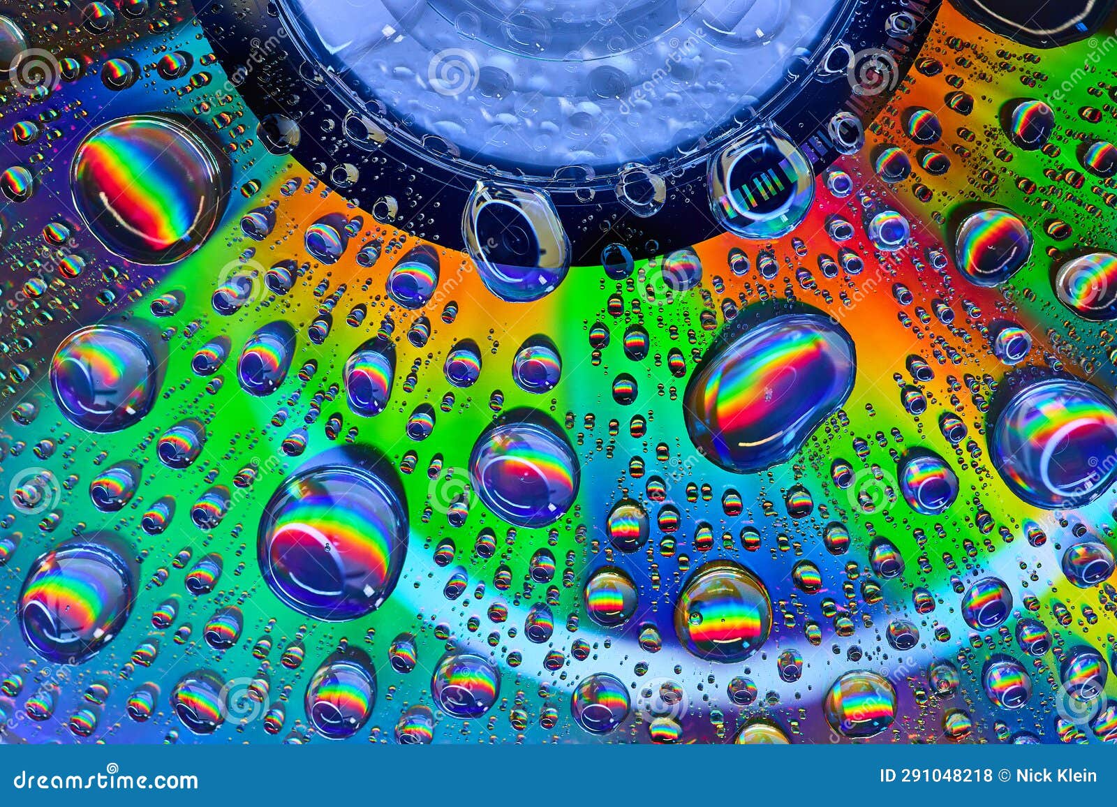 Floating Bubbles Atop Bright Colorful Metallic Surface in Abstract ...