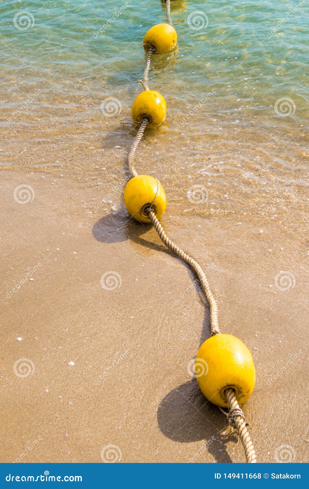 Floating Buoy and Rope Dividing the Area on Beach Stock Photo - Image ...