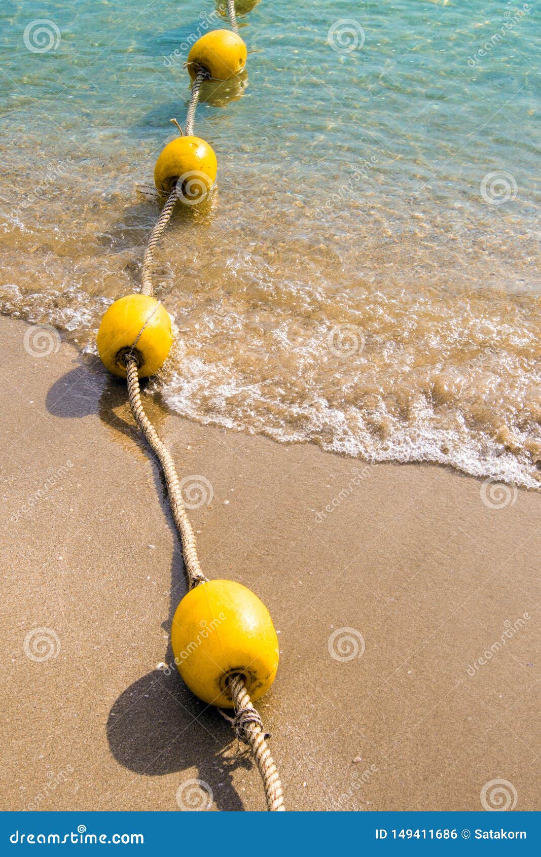 Floating Buoy and Rope Dividing the Area on Beach Stock Photo - Image ...