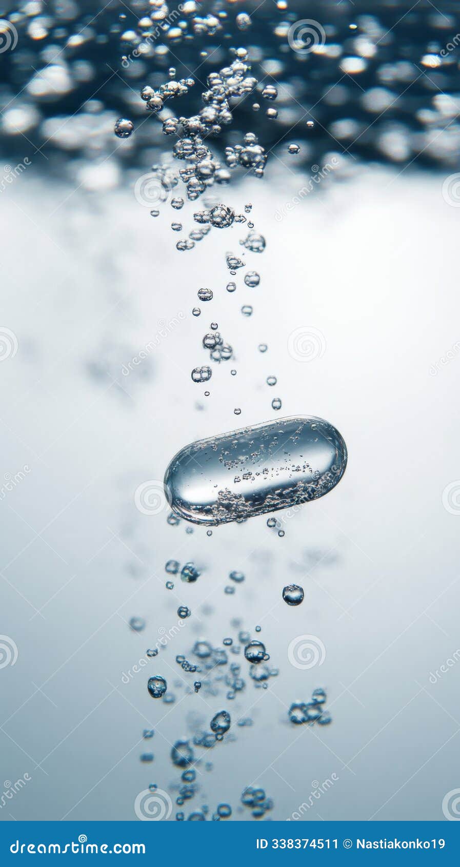 Floating Capsule in Clear Water with Soft Light and Blurred Background ...