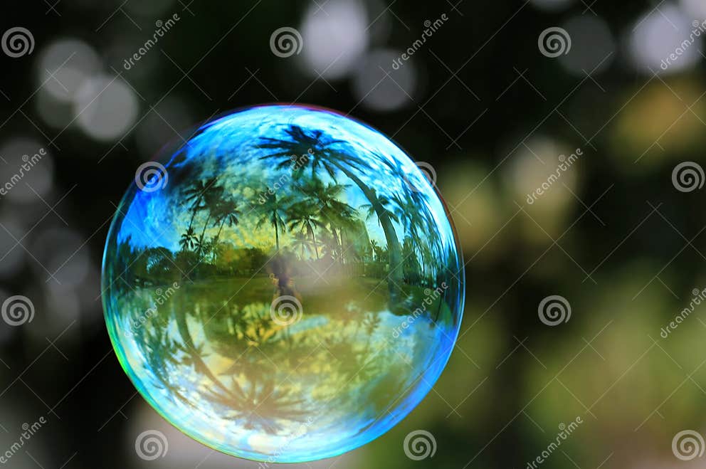 Floating Colorful Soap Bubble with Coconut Palms and Clouds Reflection ... Floating Colorful Soap Bubble with Coconut Palms and Clouds Reflection ...
