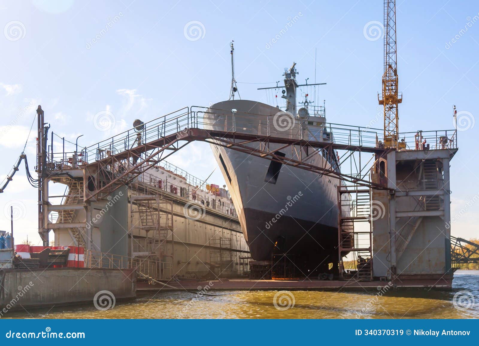 Floating Dry Dock with a Ship Under Repair Maintenance Inside Stock ...