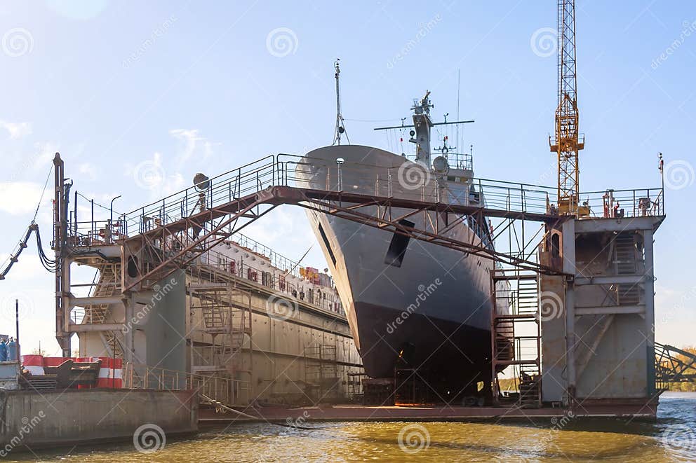 Floating Dry Dock with a Ship Under Repair Maintenance Inside Stock ...