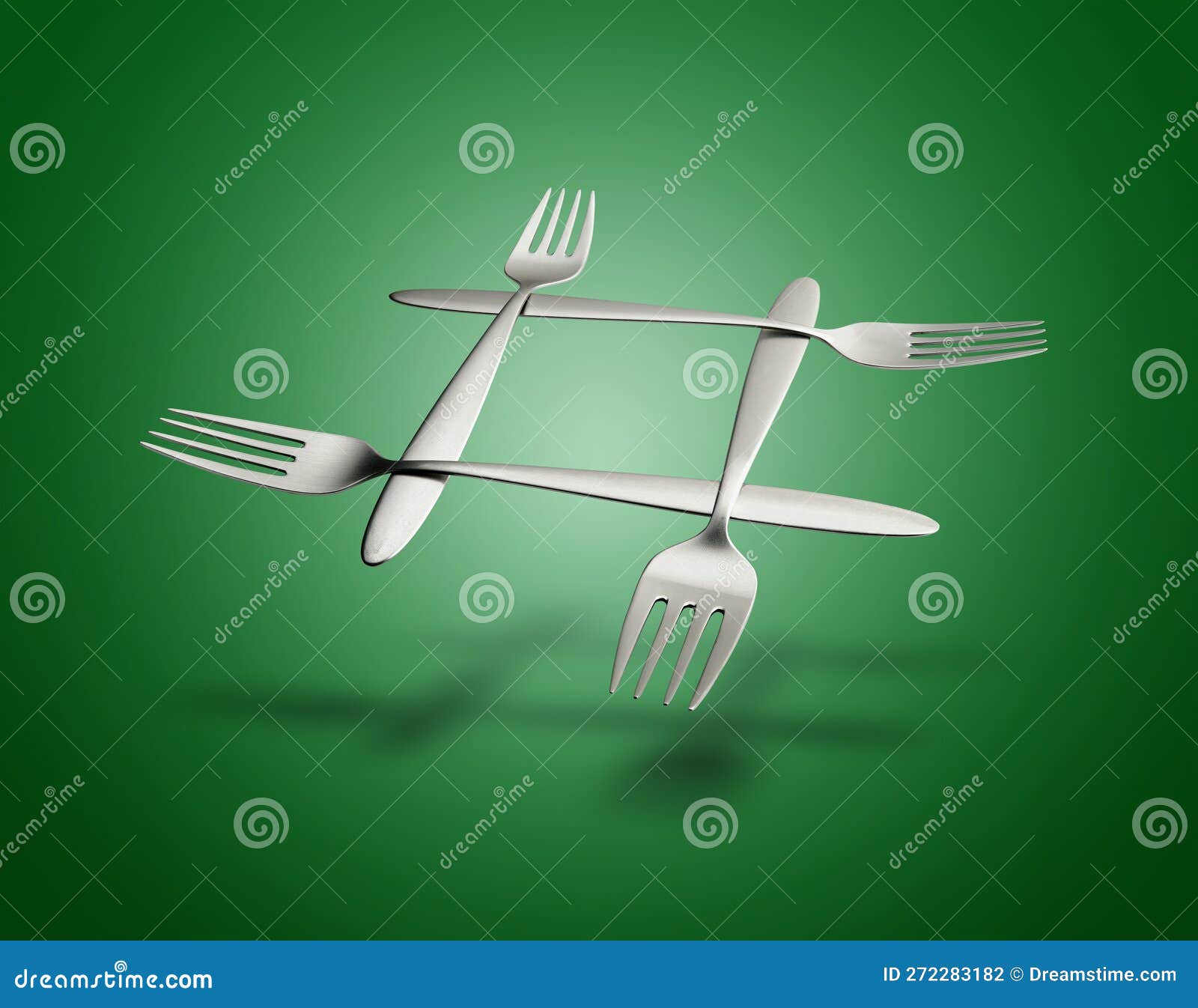 Floating Four Interlaced Silver Forks on Green Gradient Stock Photo ...