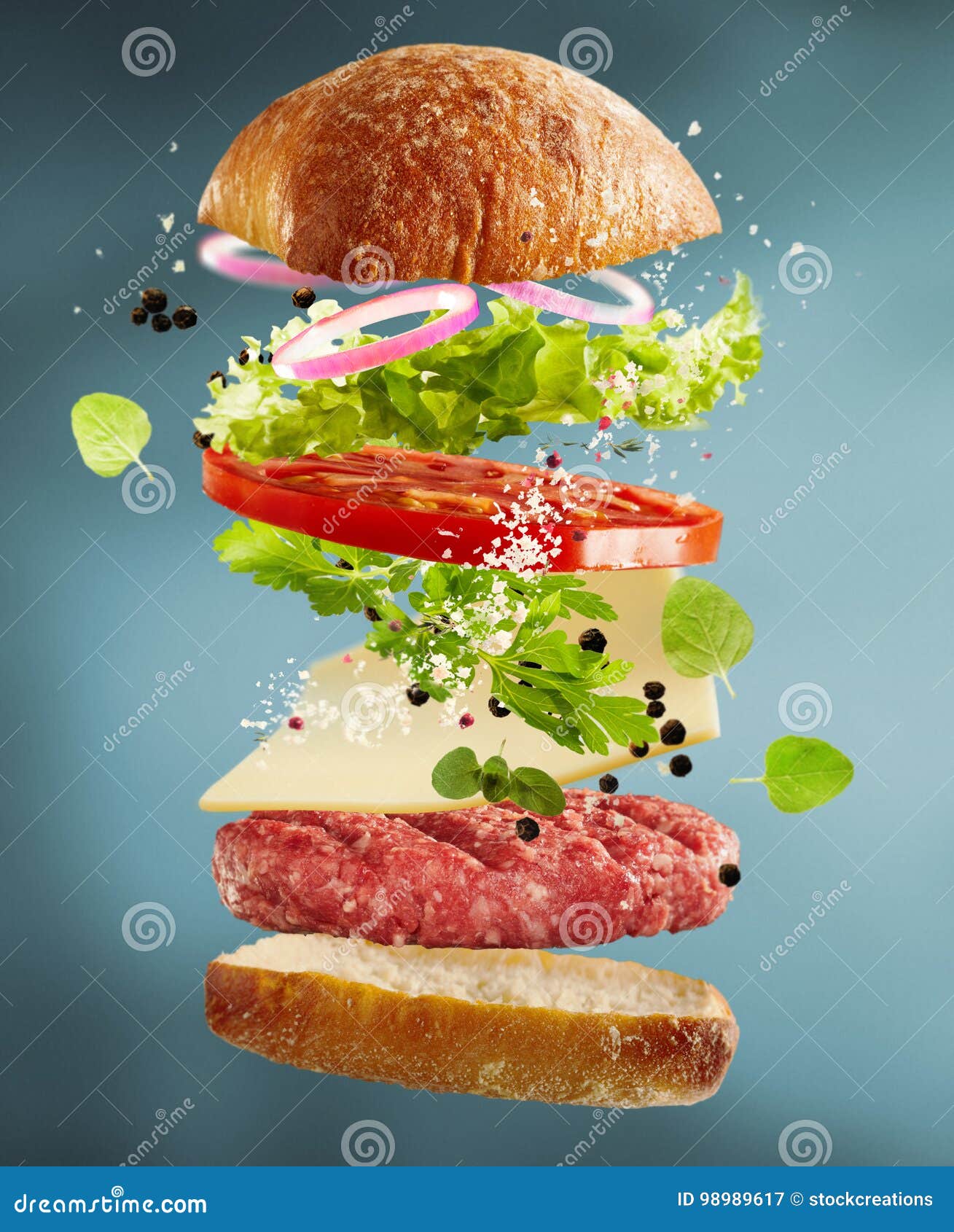Floating Layers of Ingredients for a Cheeseburger Stock Image - Image ...