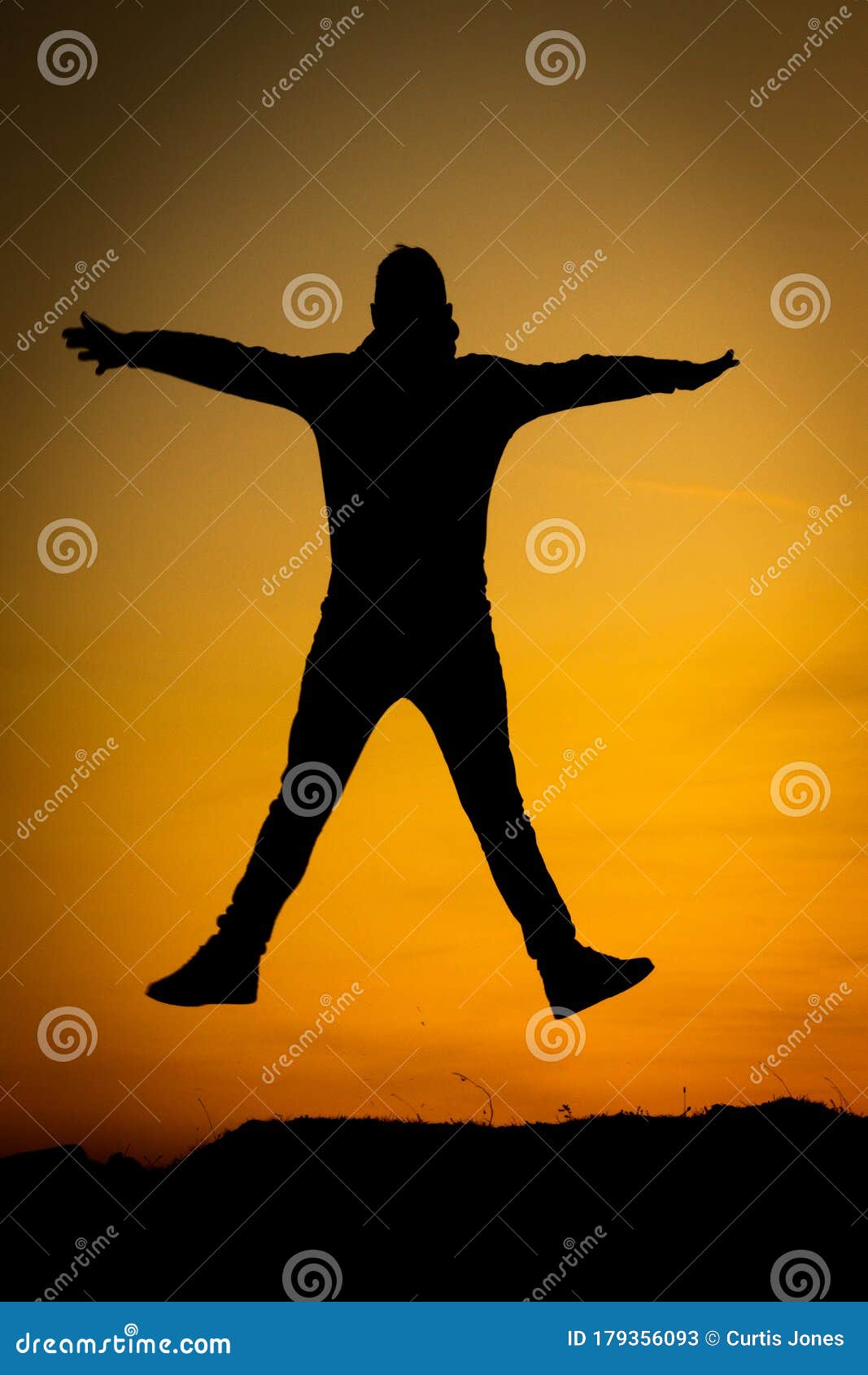 Floating man in sunset stock image. Image of flying - 179356093