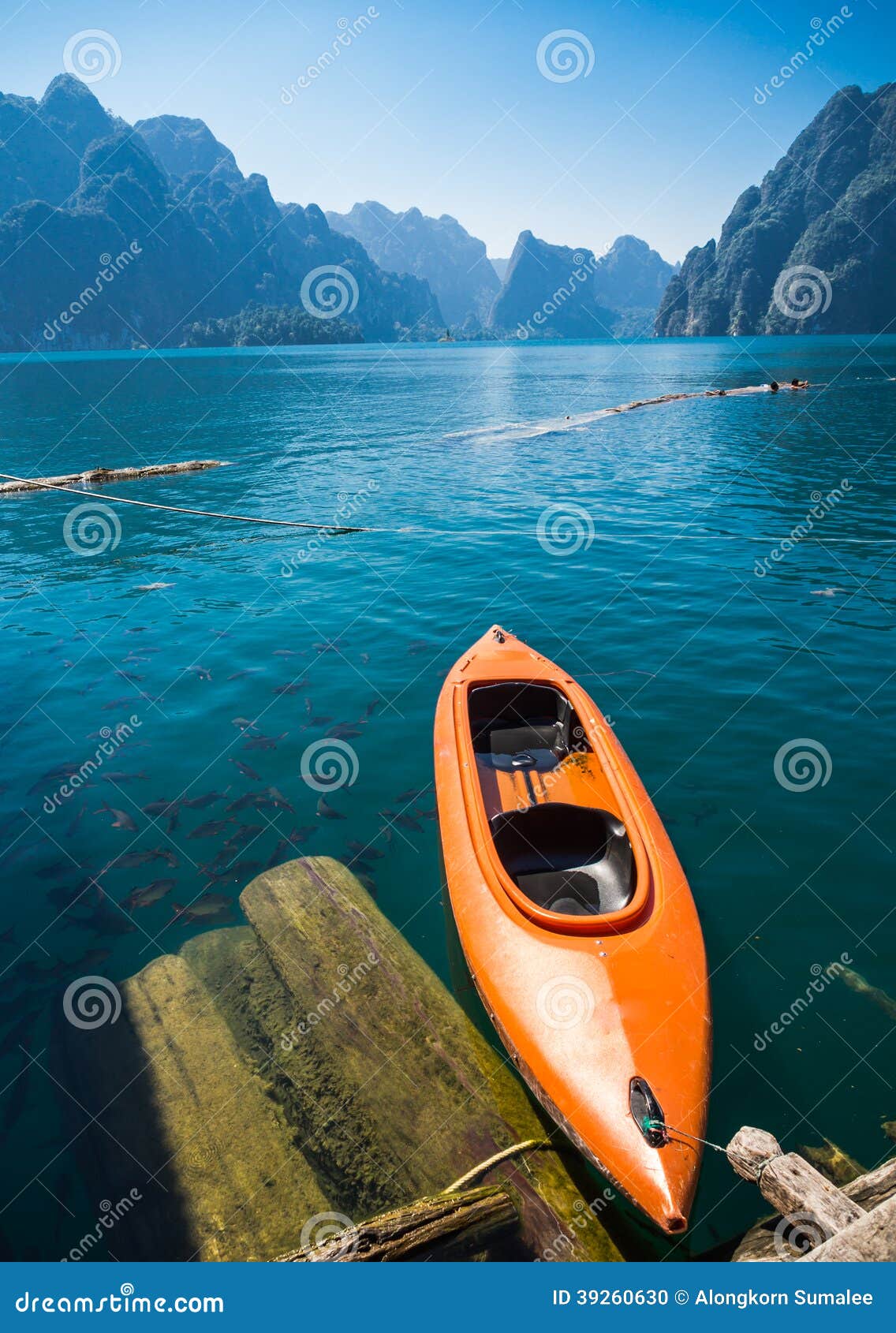 Floating Orange Canoe or Kayak in Rajjaprapha Dam Stock Photo - Image ...
