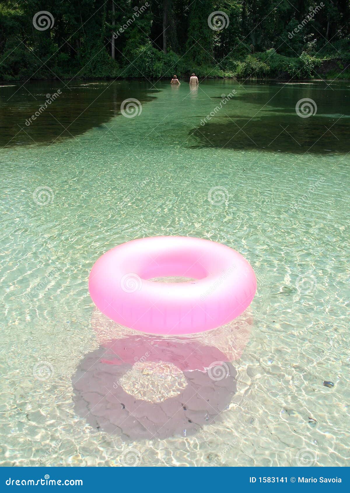 Floating pink rubber ring stock image. Image of pink, rubber - 1583141