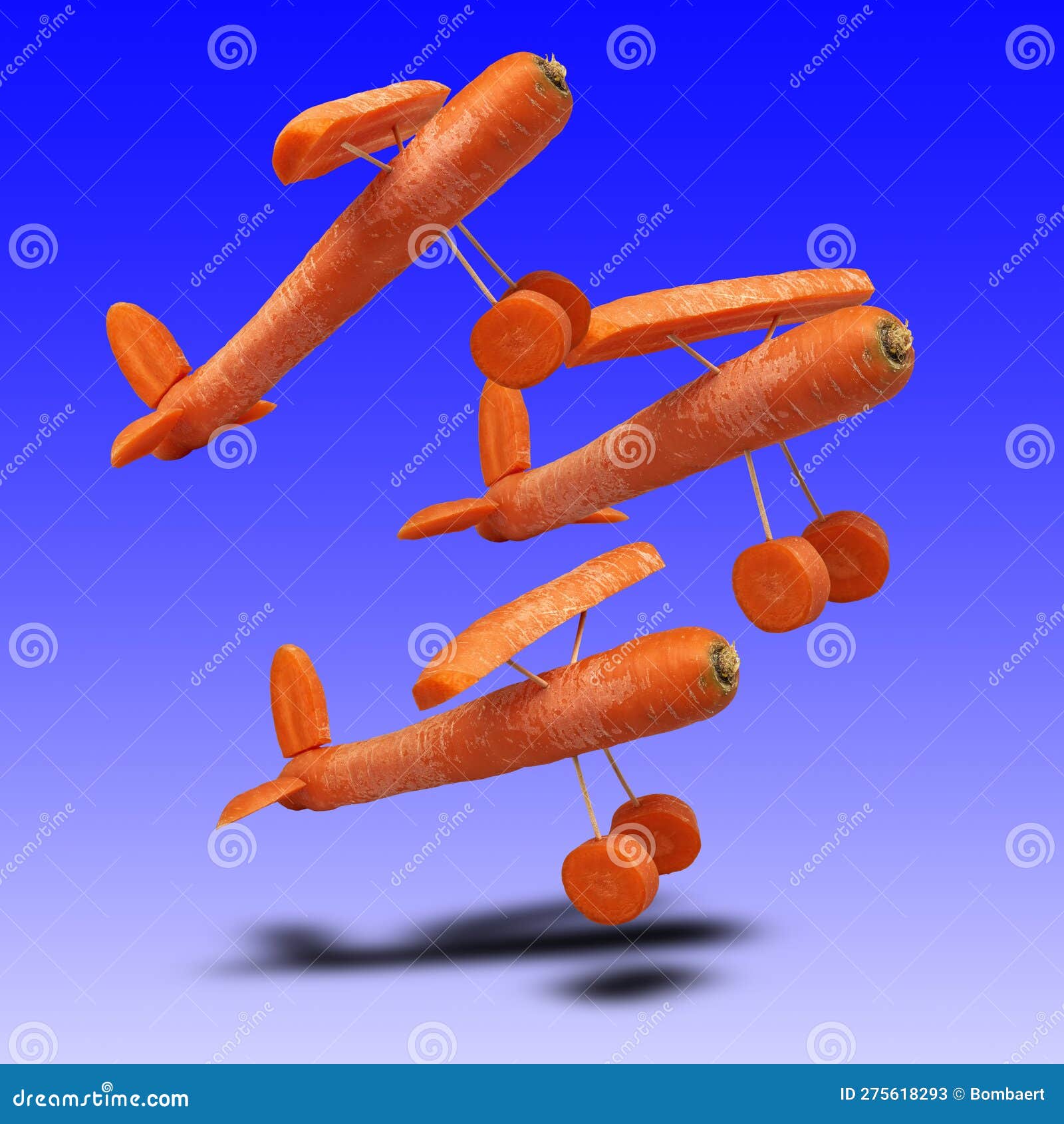 Floating Planes Made with Carrots and Toothpicks Against Blue Gradient ...