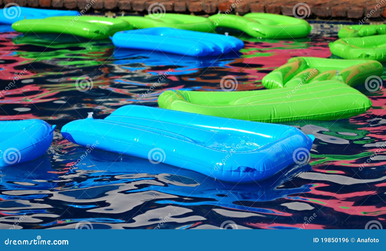 Floating plastic boards stock photo. Image of relaxing - 19850196