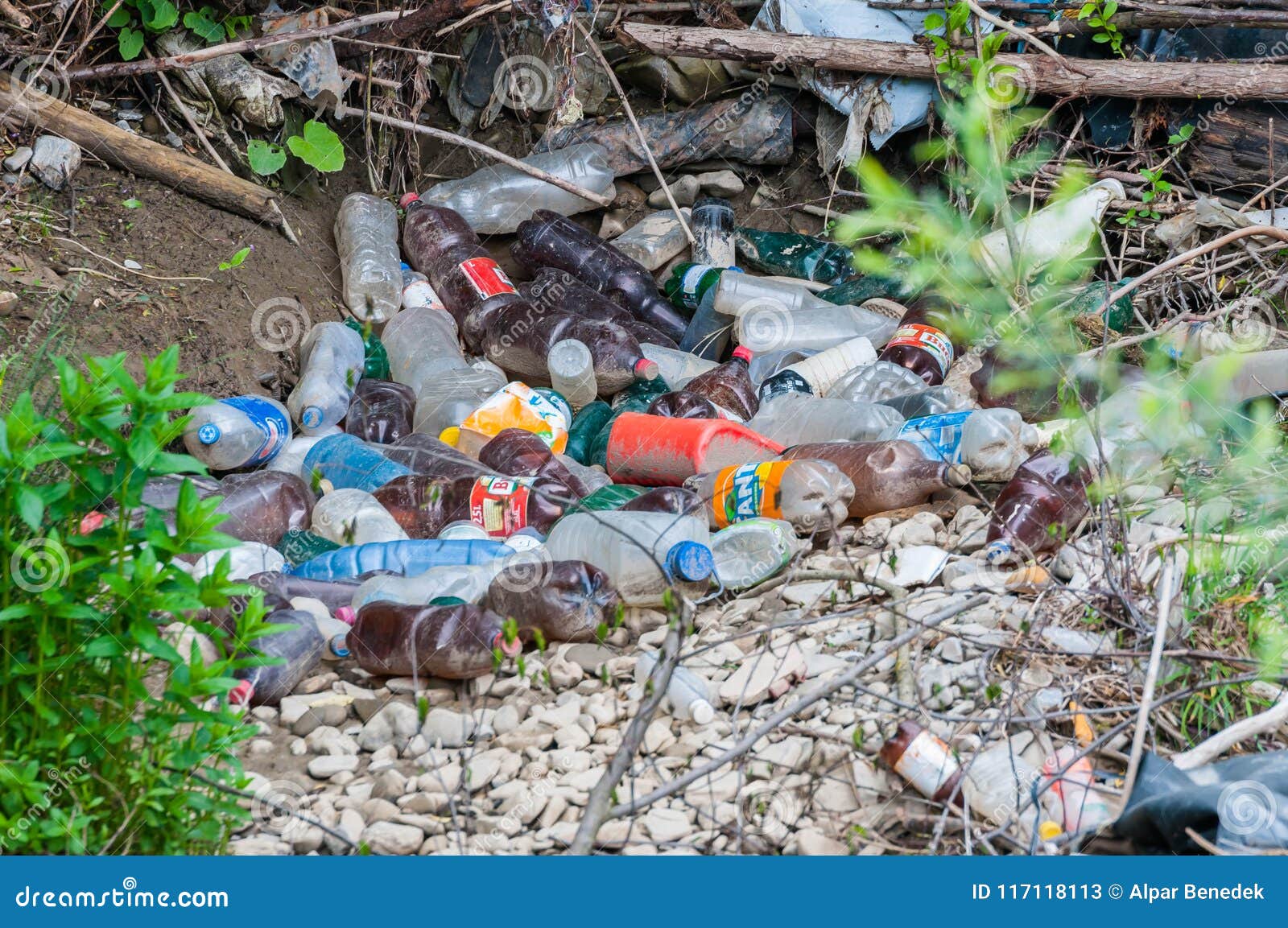 Floating Plastic Bottles, Human Garbage in the Small River Editorial ...