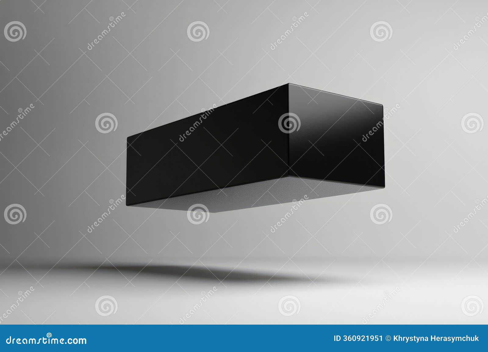 Floating Rectangular Prism in Black, Softly Reflecting Light, Creating ...