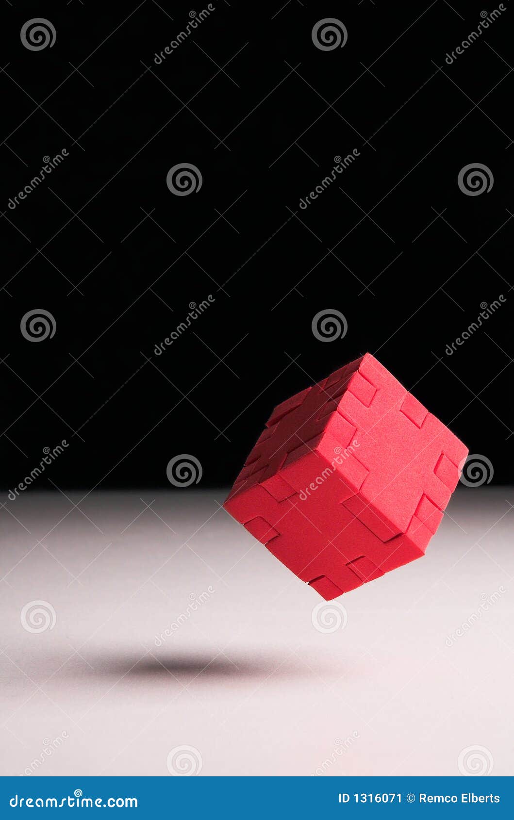 Floating red puzzle cube stock image. Image of geometrical - 1316071