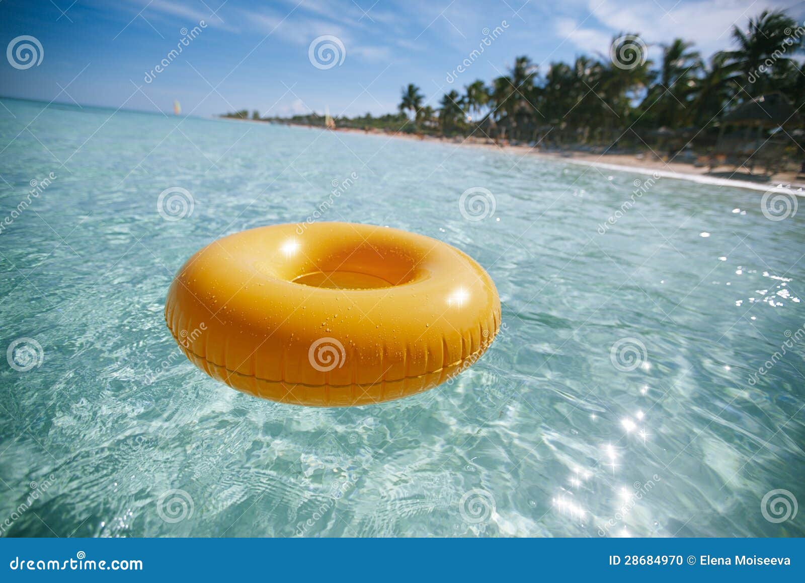 Floating Ring on Blue Clear Sea with Beach Stock Photo - Image of float ...