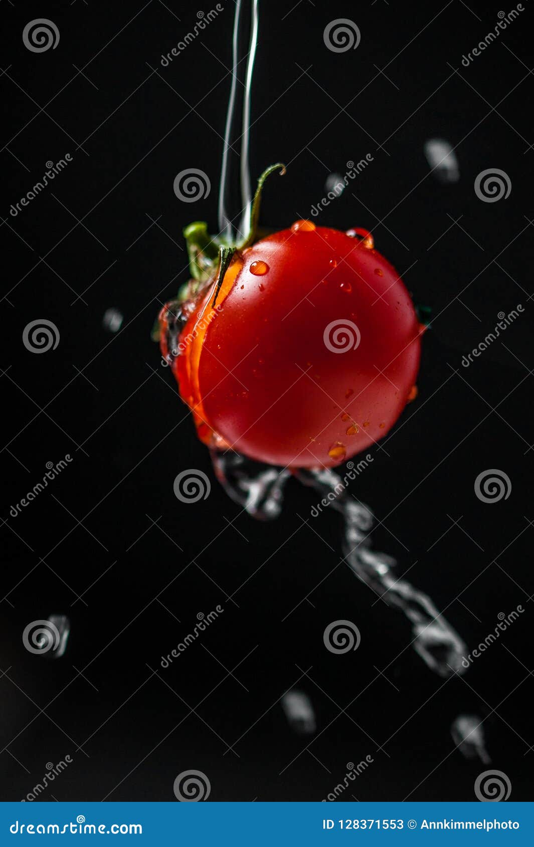 Floating Ripe Cherry Tomatoes Under Runing Water. Selective Focus Stock ...