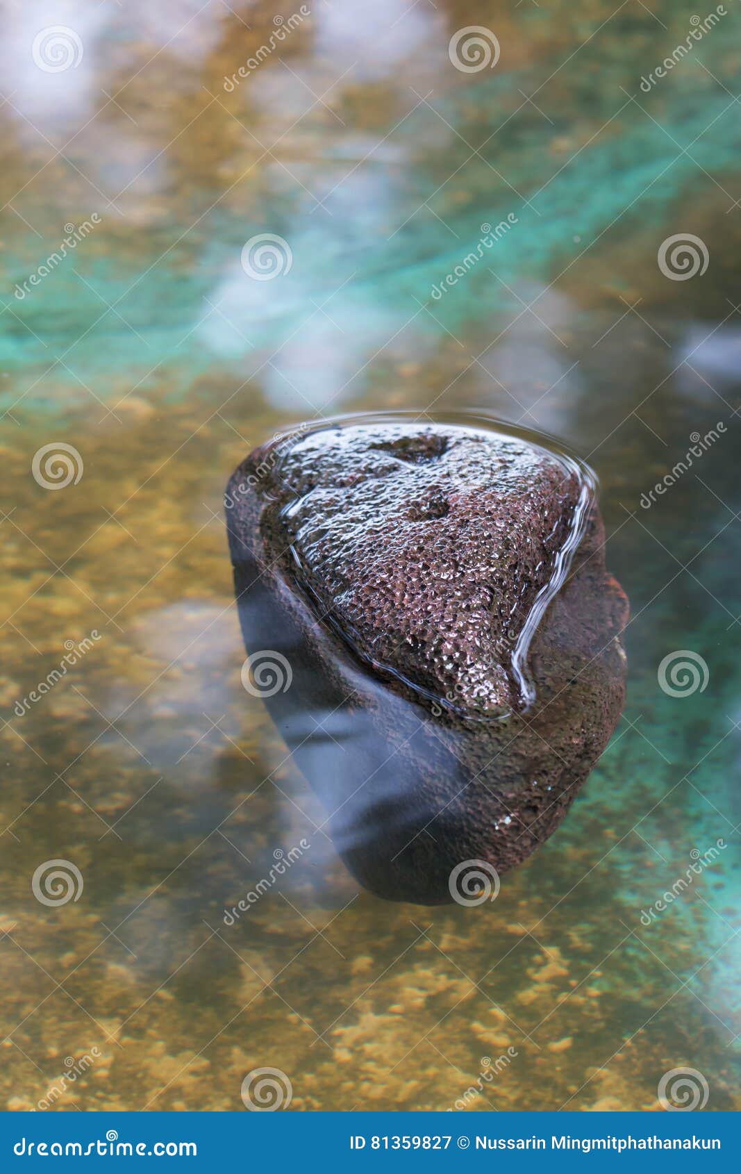 Floating rock. stock image. Image of black, design, scoriaceous - 81359827