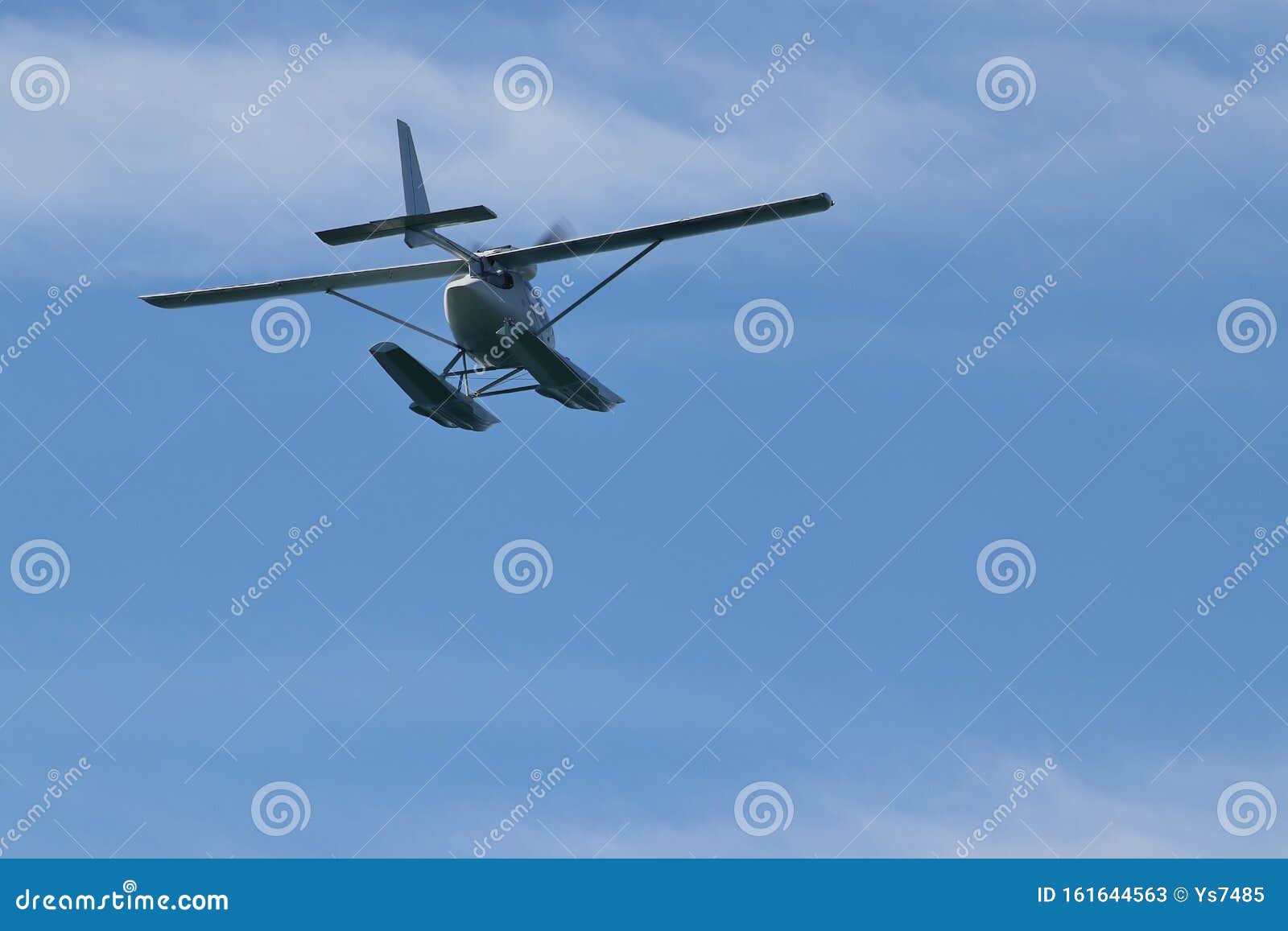 Floatplane Hydroplane or Seaplane Flying in Blue Sky. Stock Image ...