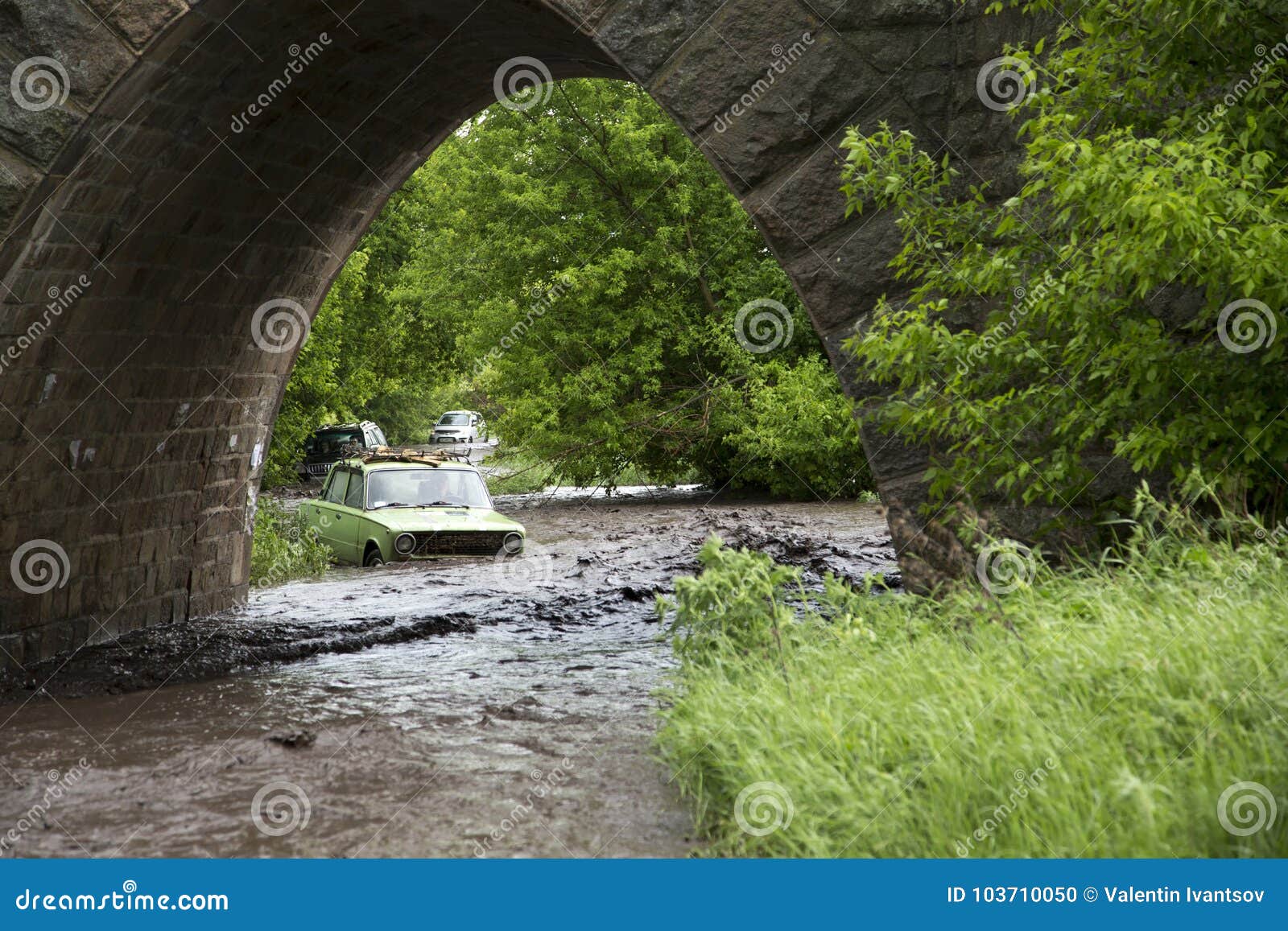 Flooded Cars on the Road during a Heavy Rainfall. Editorial Image ...