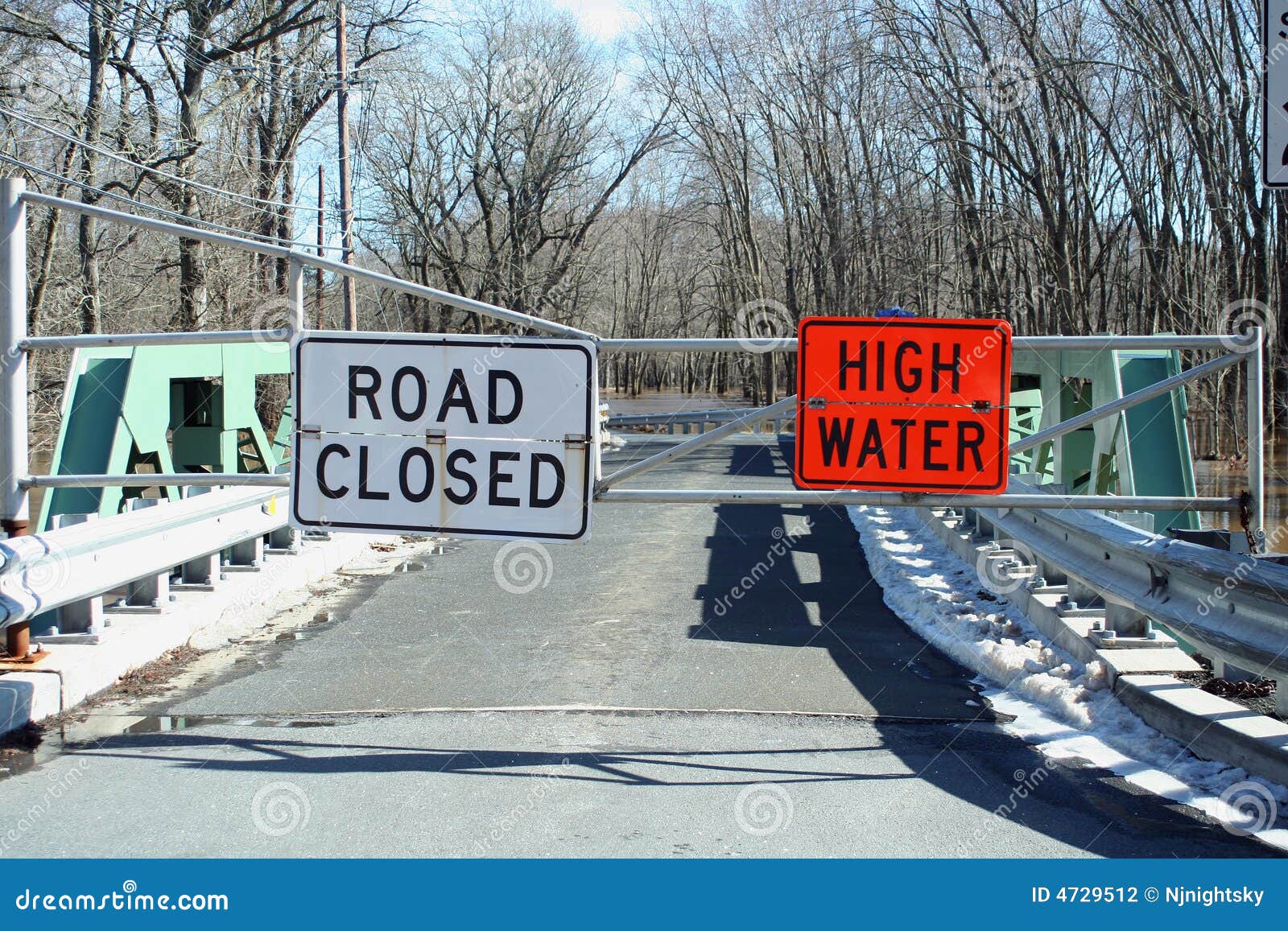Flooded Road Closed Sign on a Bridge Stock Photo - Image of flood ...