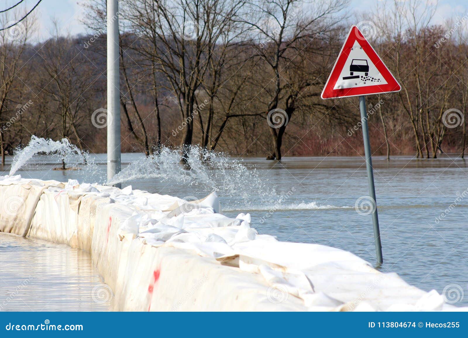 Flooded Soft Verge Road Sign Next To Box Barriers Flood Protection ... Flooded Soft Verge Road Sign Next To Box Barriers Flood Protection ...