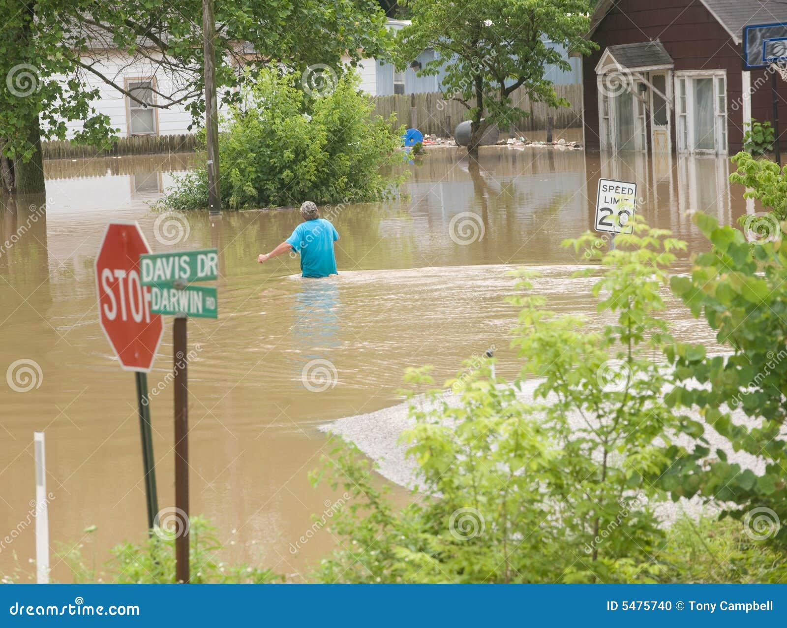 Flooded town editorial image. Image of spash, flooding - 5475740