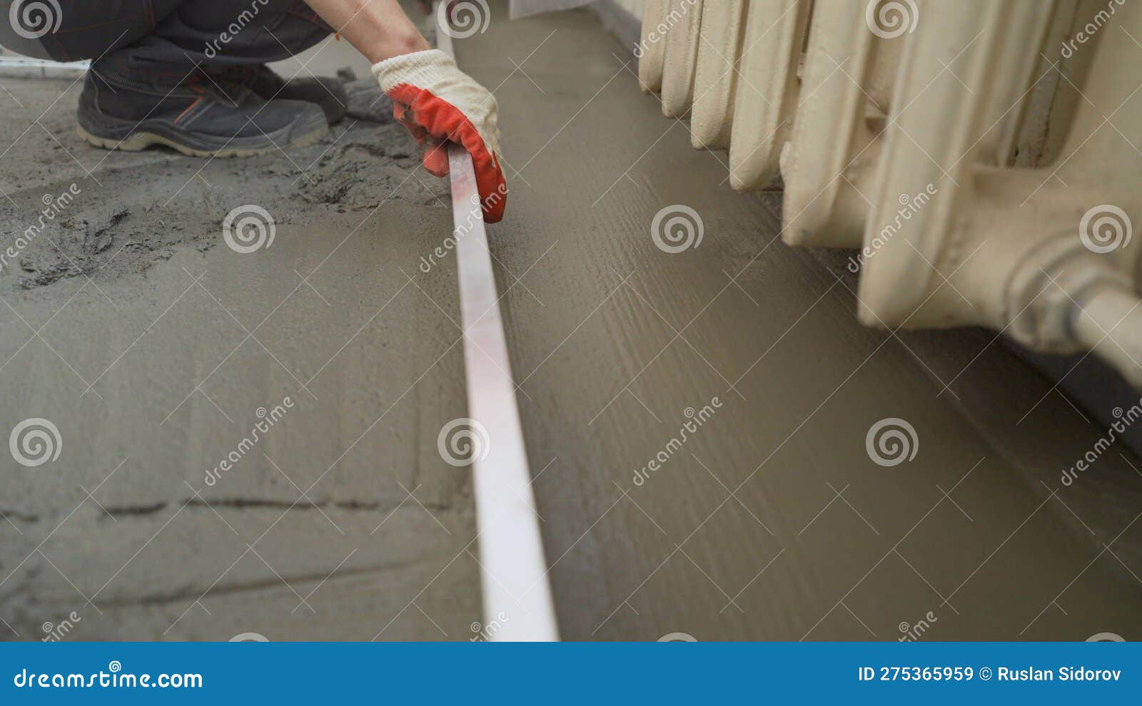 Floor Cement Work. Plasterer Smoothing Floor Surface with Screeder ...