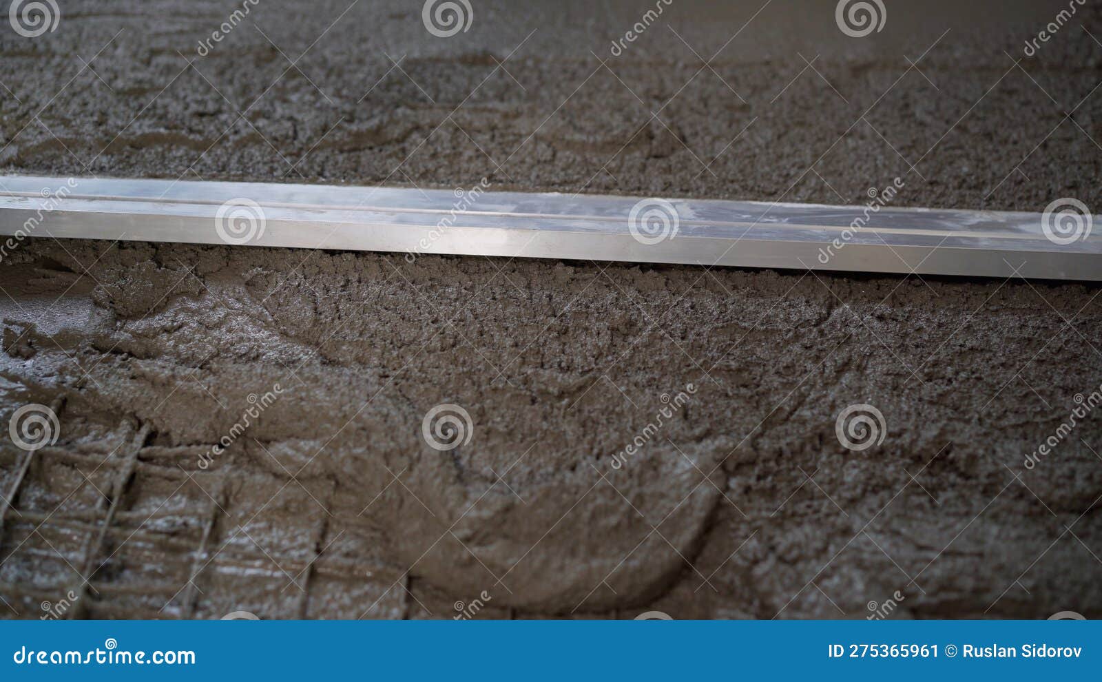 Floor Cement Work. Plasterer Smoothing Floor Surface with Screeder ...