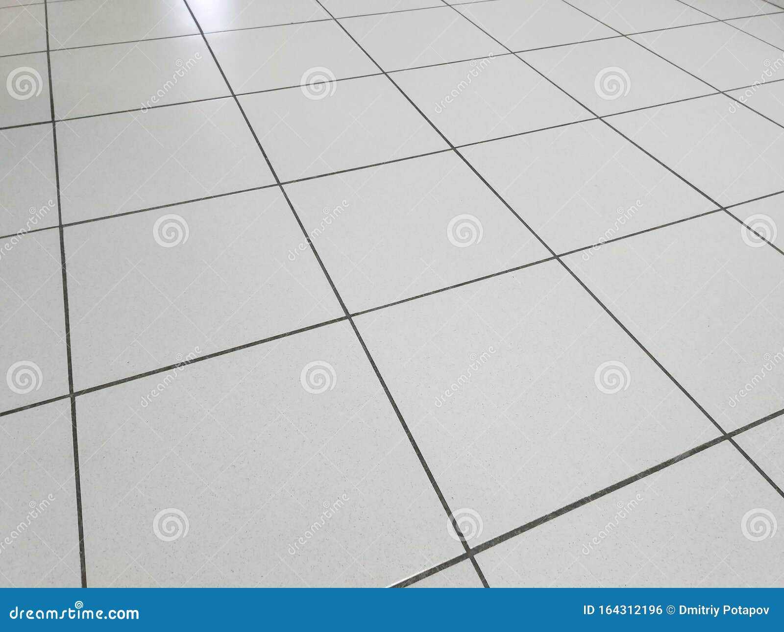 The Floor is Made of White Square Tiles, Straight Lines. Stock Photo ...