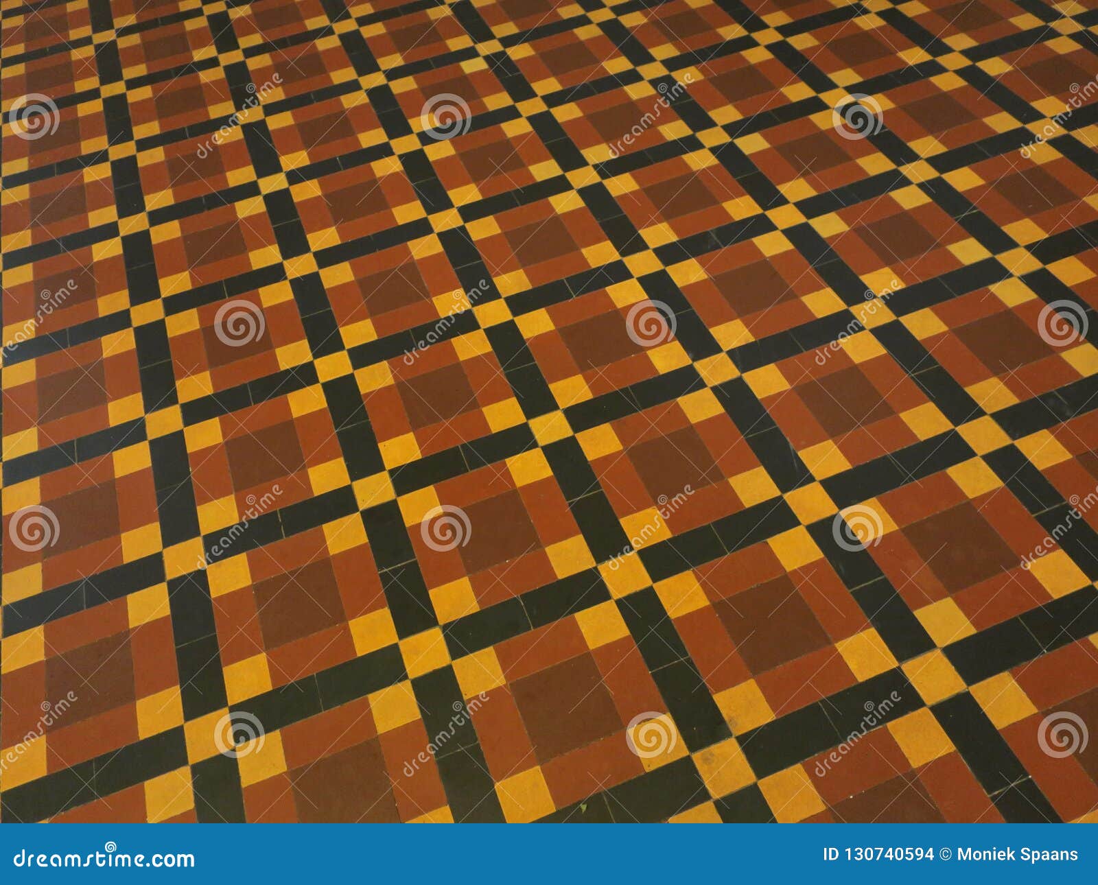 Floor with Pattern in a Red, Yellow and Black Tiles Stock Photo - Image ...