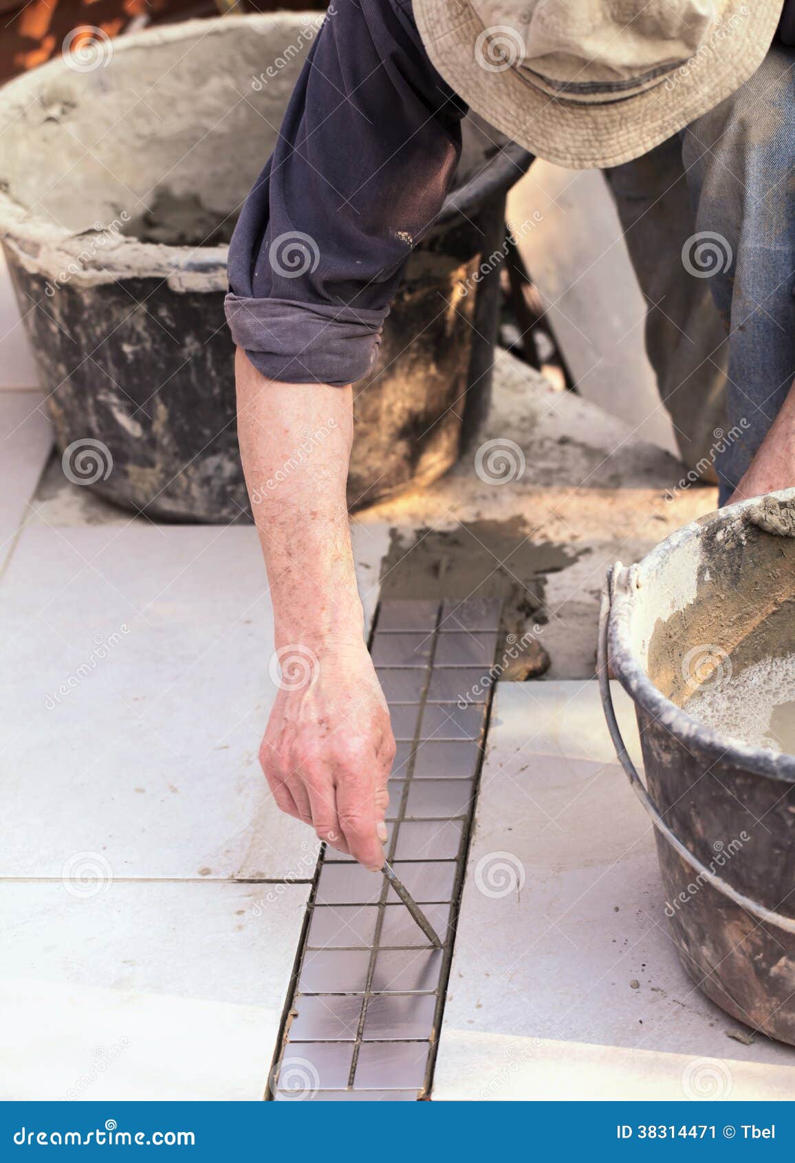 Floor tiler at work 3 stock image. Image of industry - 38314471