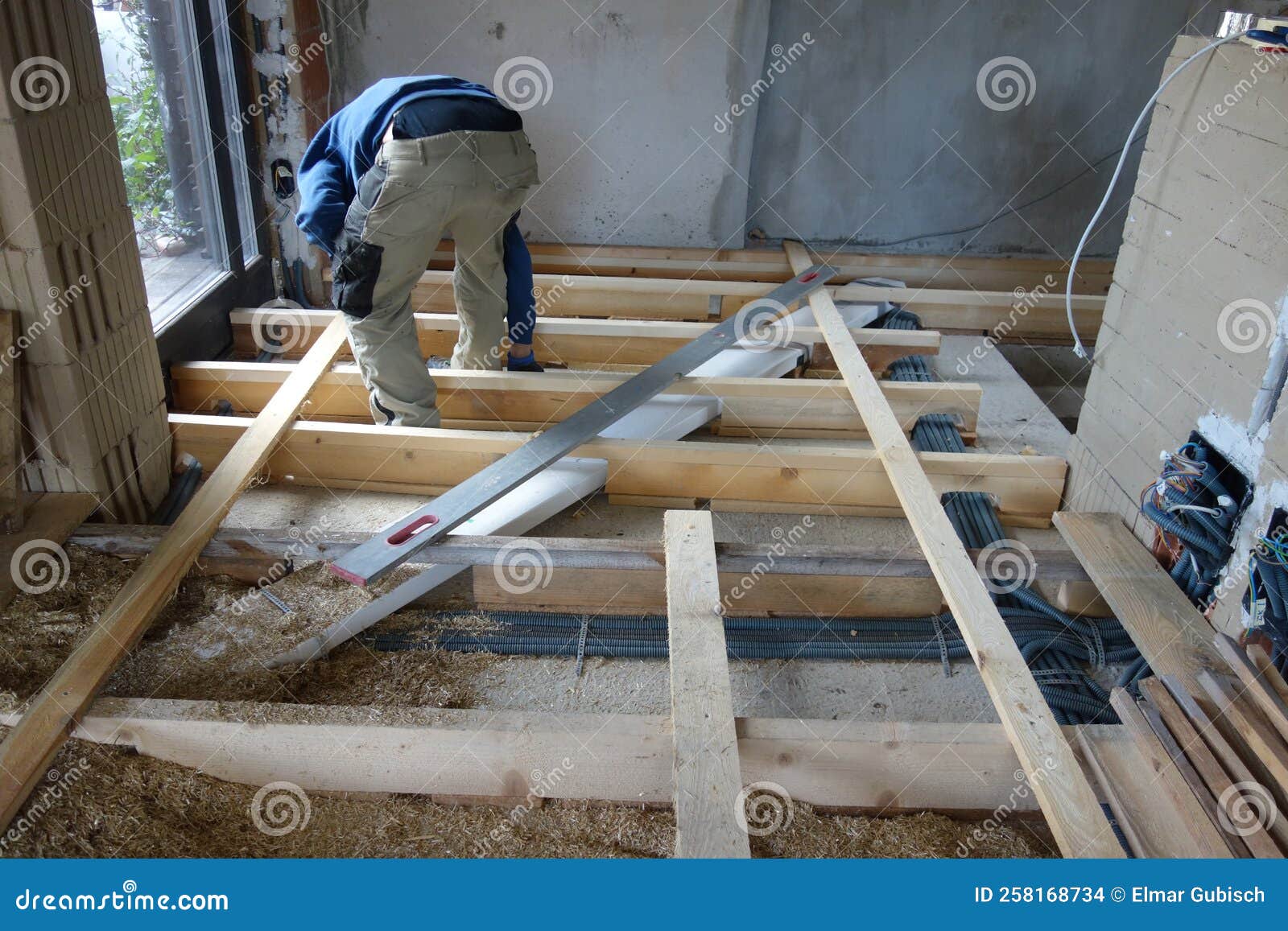 Floorer Laying a Floor in a Building Stock Photo - Image of labor ...