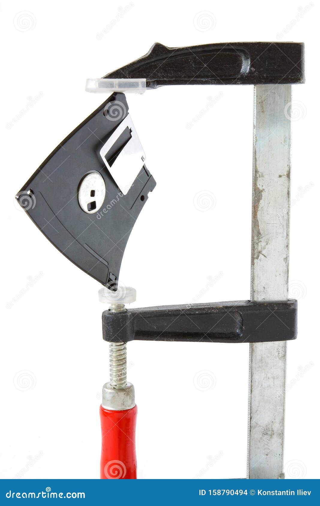 A Floppy Disk Caught in Carpentry Clamps Stock Photo - Image of memory ...