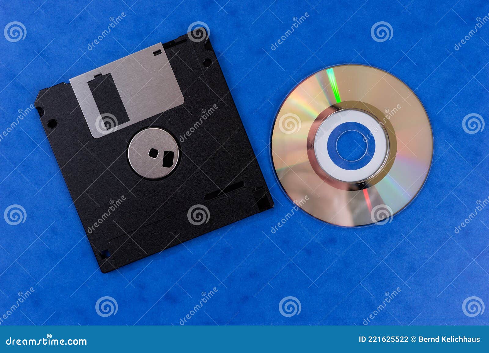 Floppy Disk and Classic Compact Disc on Blue Background Stock Photo ...