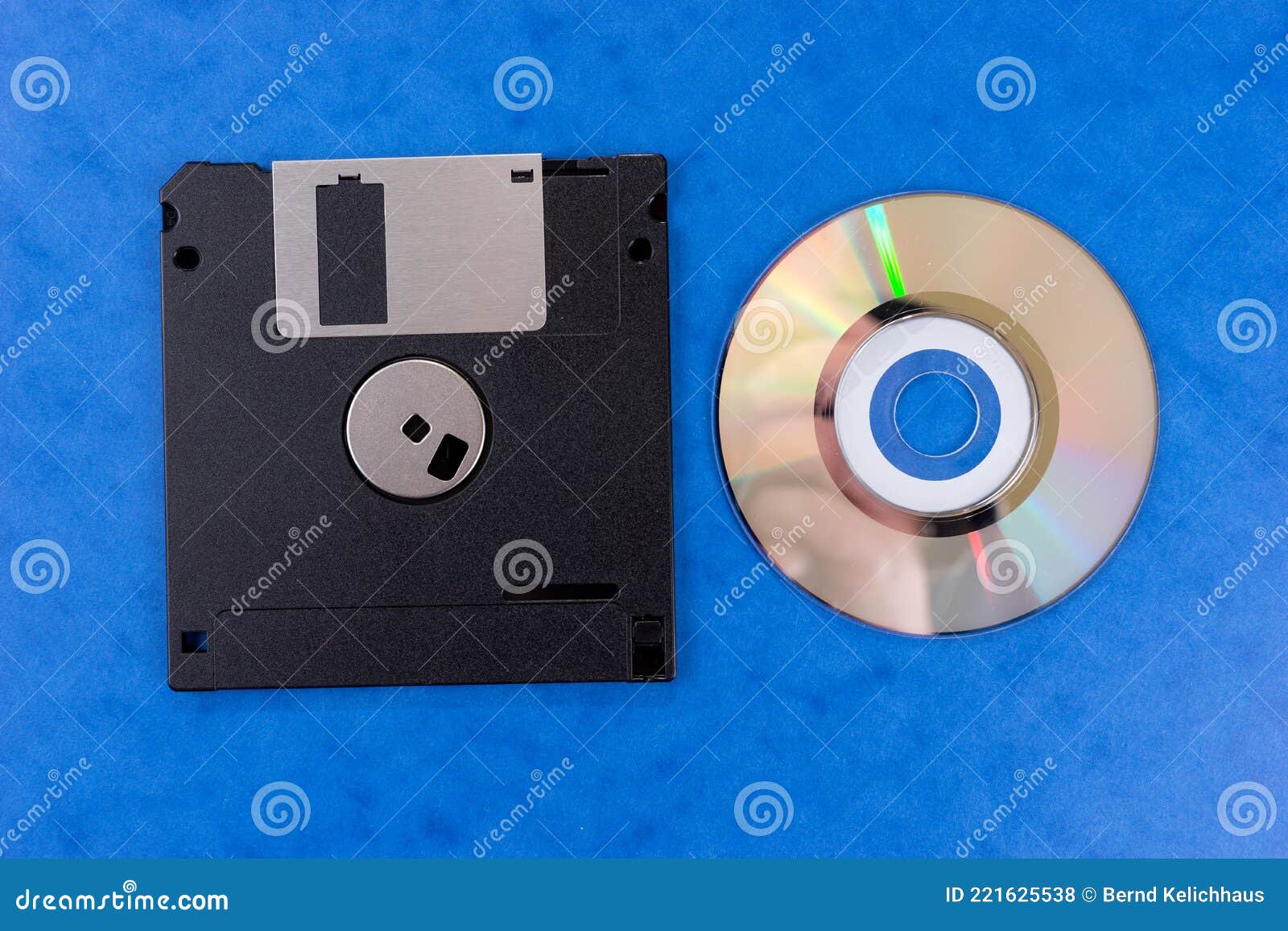 Floppy Disk and Classic Compact Disc on Blue Background Stock Photo ...