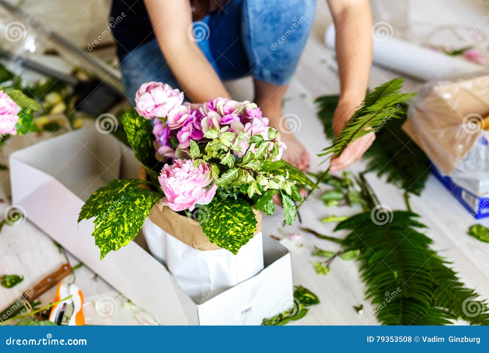 Florist Making a Bouguet of White Flowers and Peonies Stock Photo ...