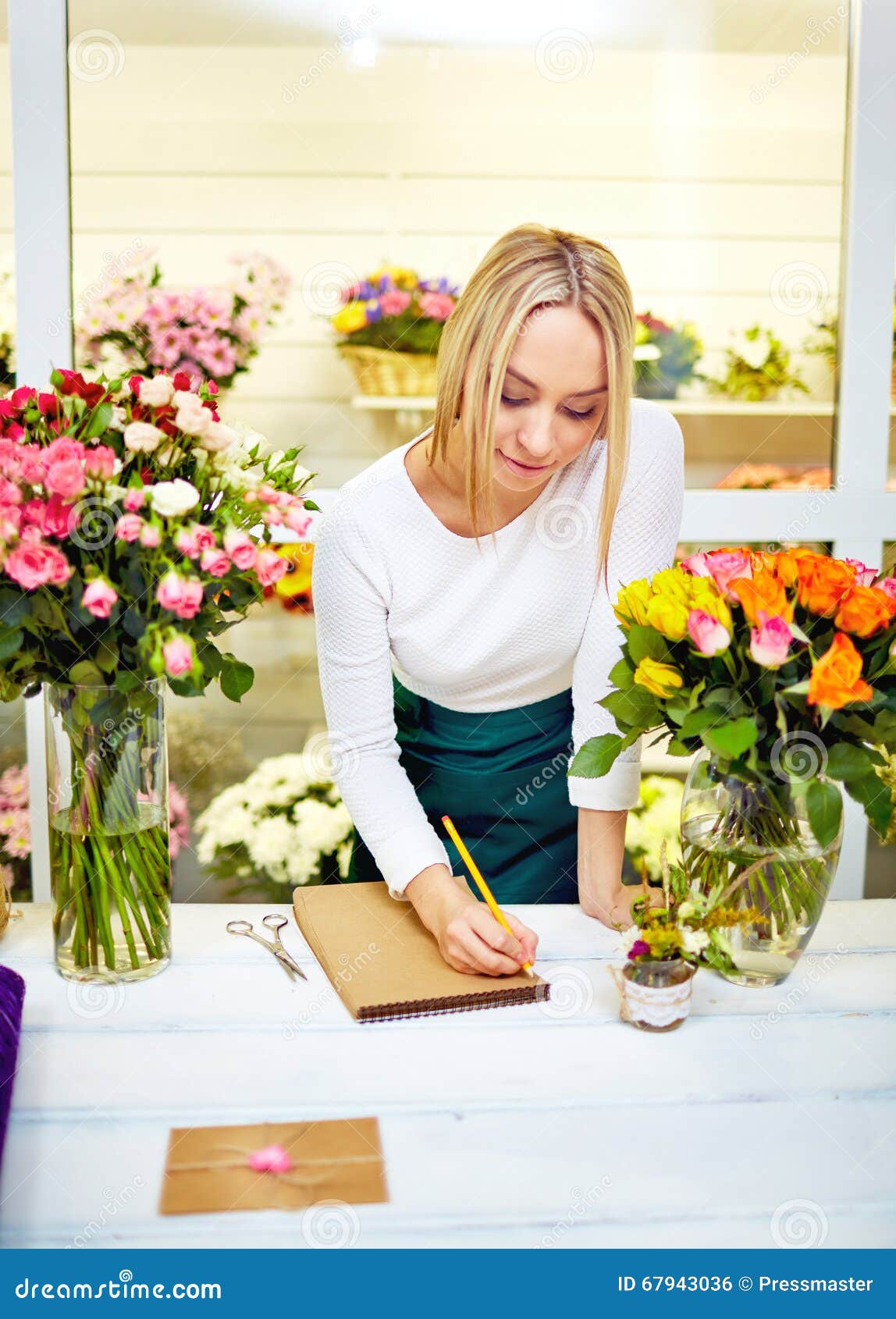Florist at work stock photo. Image of beautiful, people - 67943036