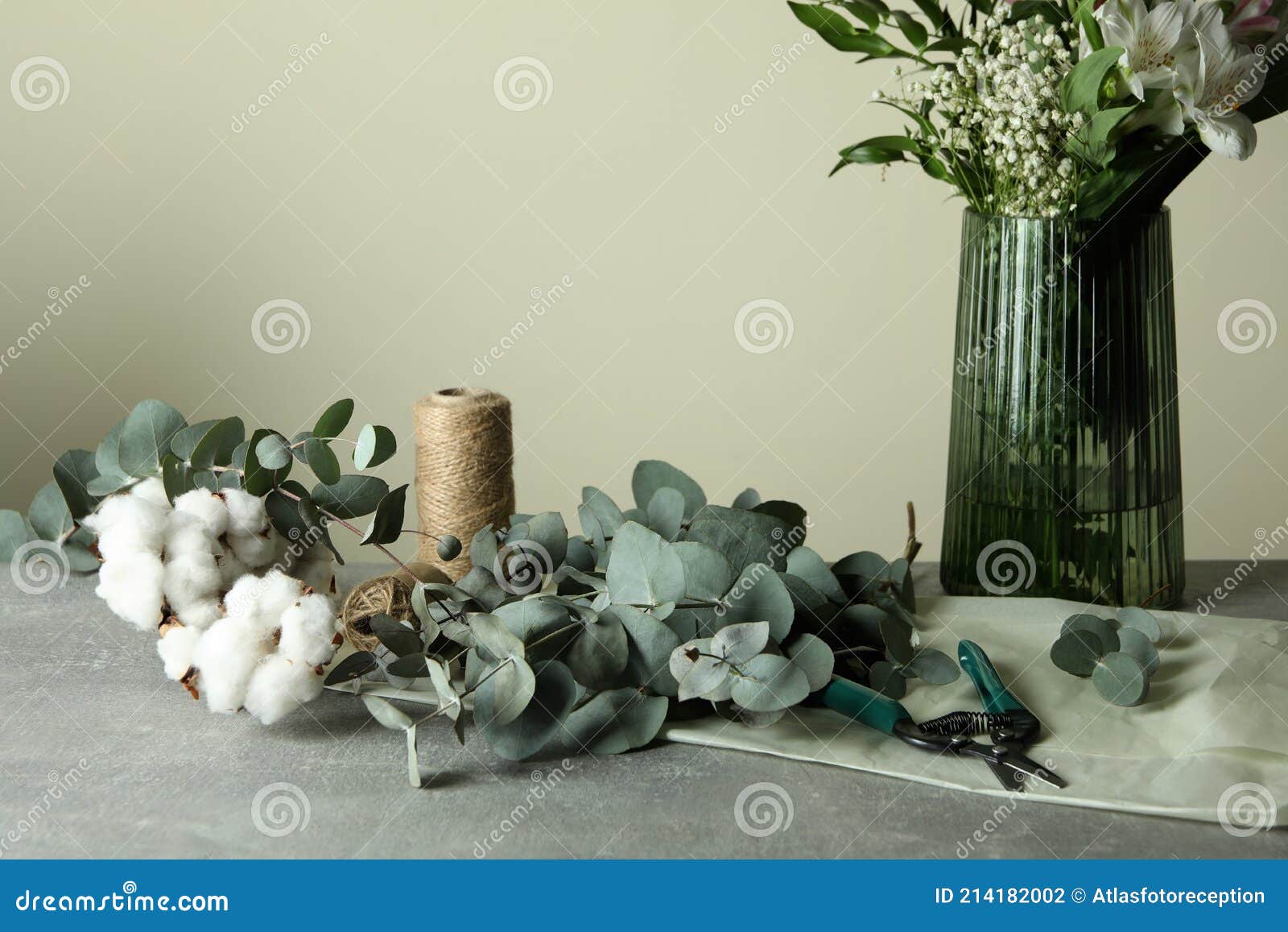 Floristic Concept with Eucalyptus, Flowers and Cotton on Gray Table ...