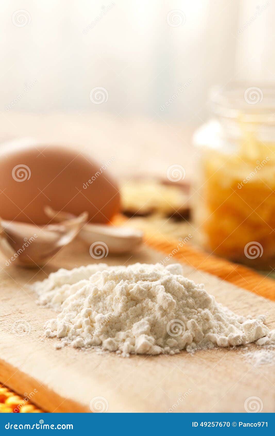 Flour on the kitchen table stock photo. Image of uncooked - 49257670