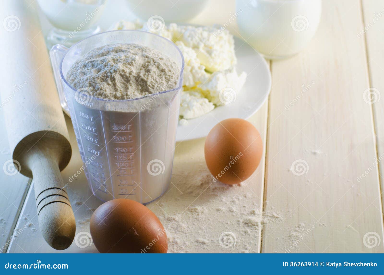 Flour into measuring cup stock photo. Image of dishes - 86263914