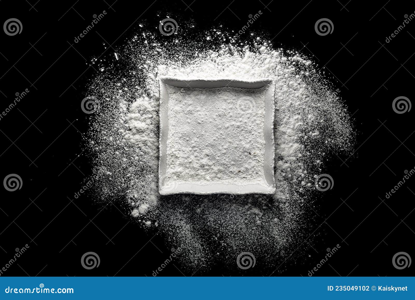 Flour is Scattered from a Bowl on a Black Table. Top View Stock Photo ...