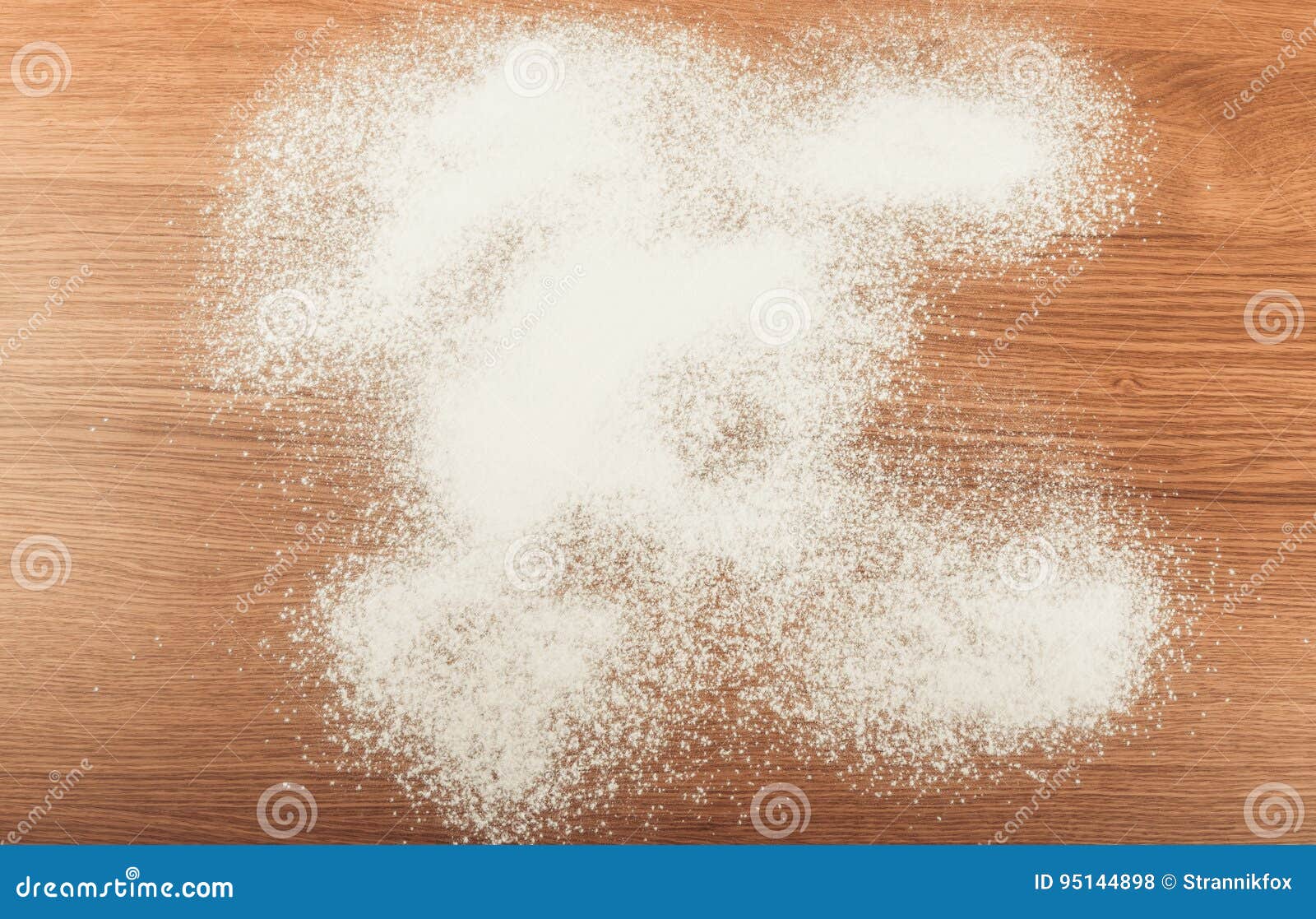 Flour is Scattered on a Light Wooden Table. Toned Stock Photo - Image ...