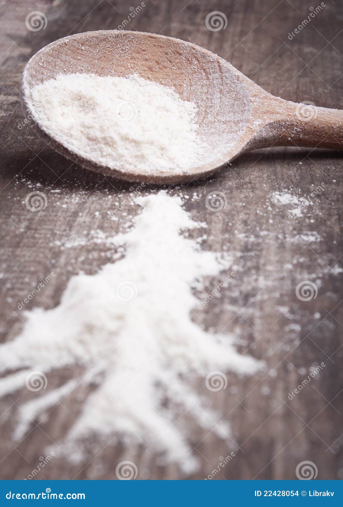 Flour in a wooden spoon stock photo. Image of instrument - 22428054