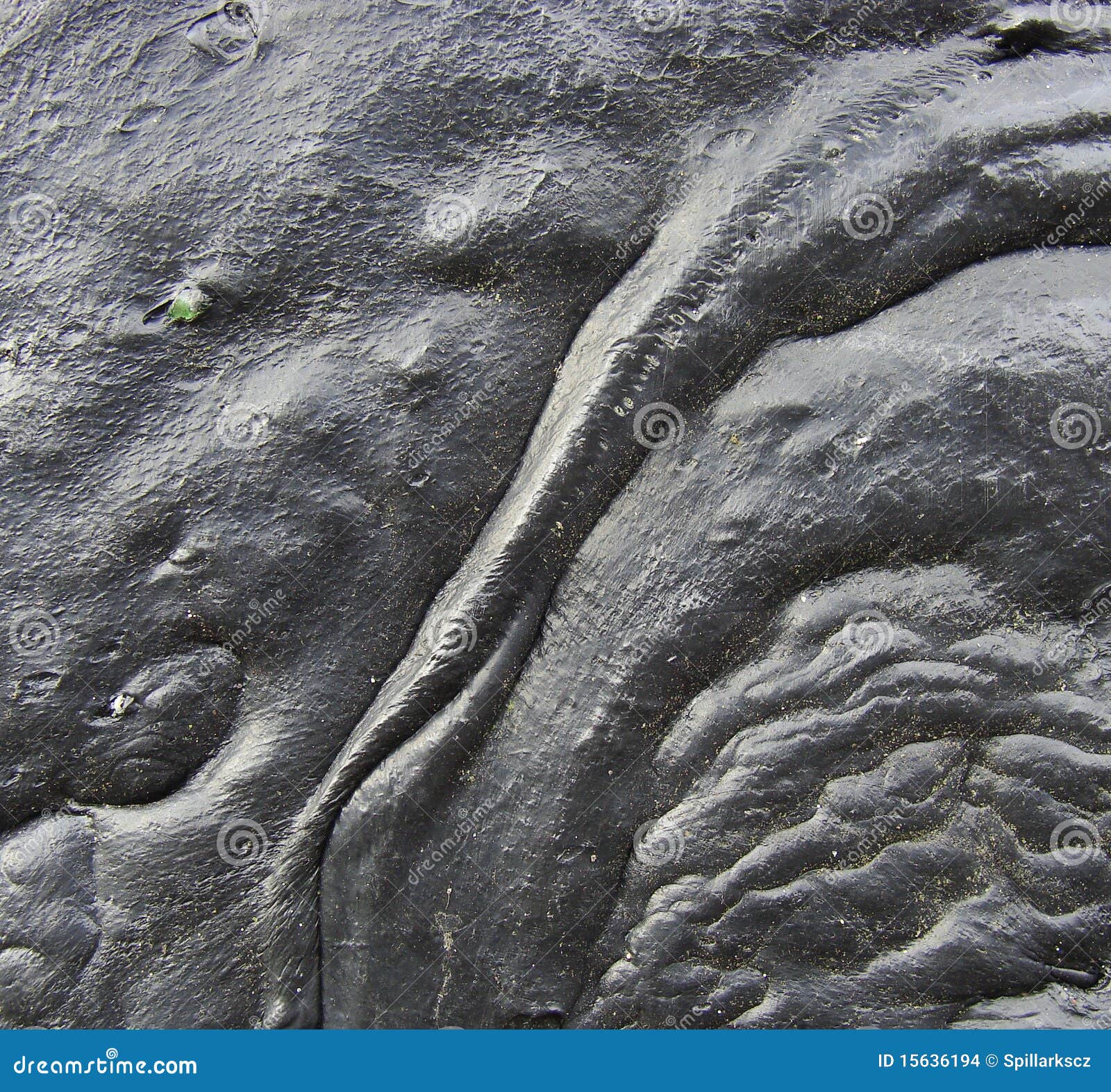 Flow of a Black Reflective Tar Lava Like Substance Stock Photo - Image ...