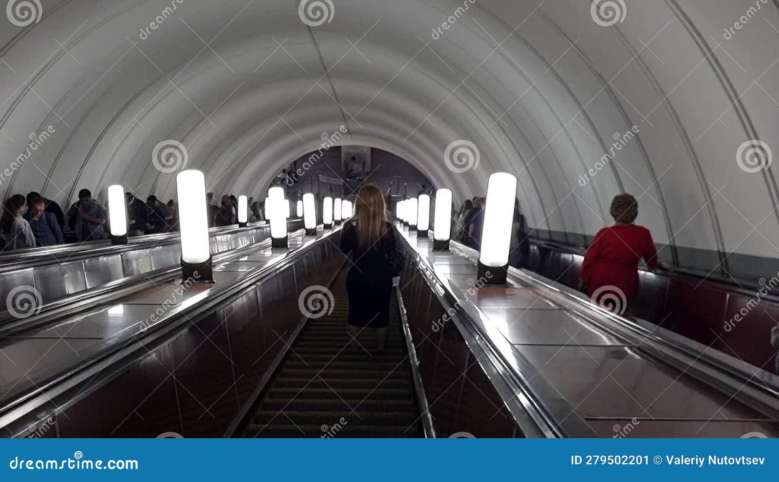 The Flow of Passengers on the Escalator of the Moscow Metro. Stock ...