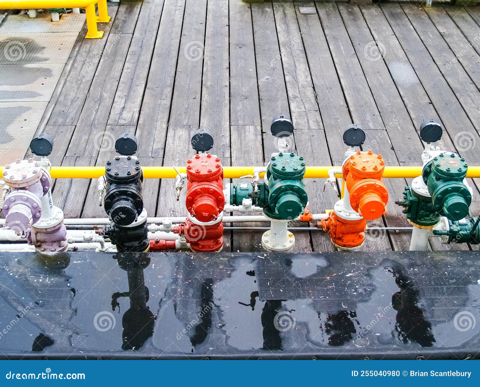 Flow Valves in Different Colors in Line Stock Photo - Image of fuel ...