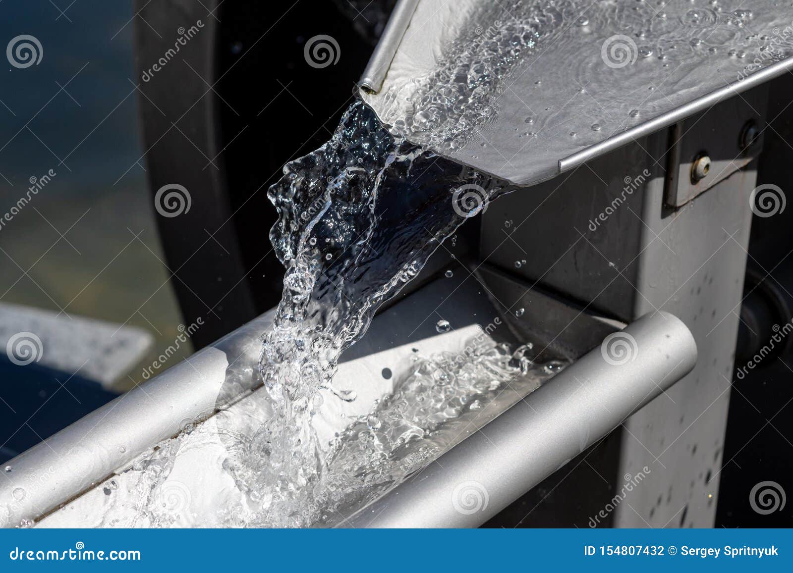 The Flow of Water Flows Down the Metal Drain Stock Photo - Image of ...
