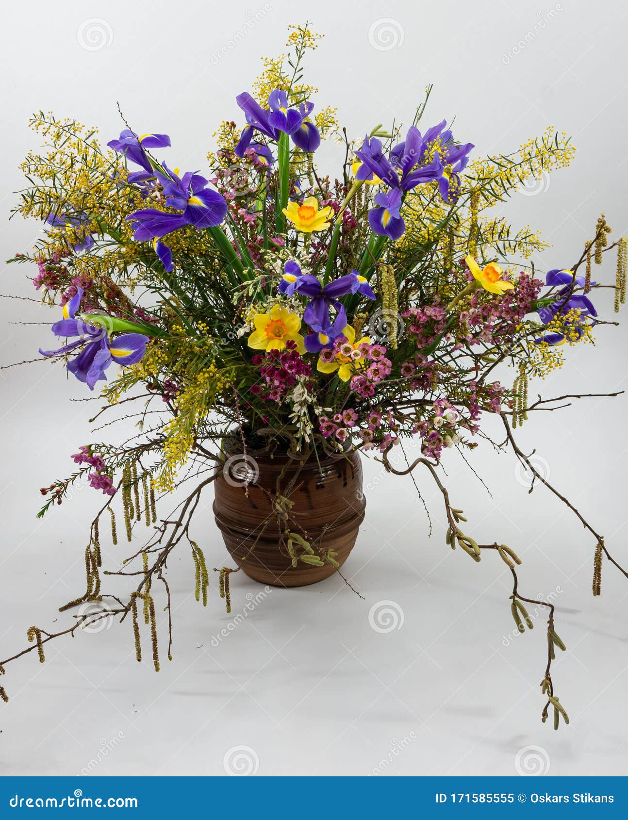 Flowers Arrangement in a Vase with Irises and Daffodils Stock Image ...