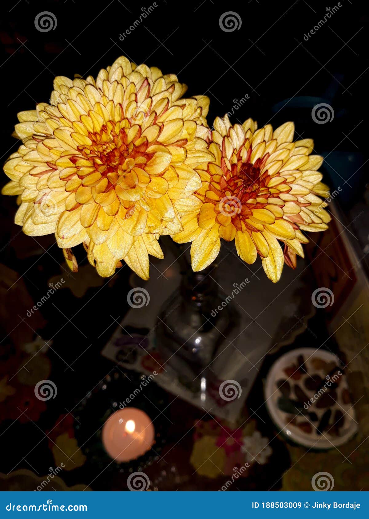 Flower in the base stock image. Image of candle, light - 188503009