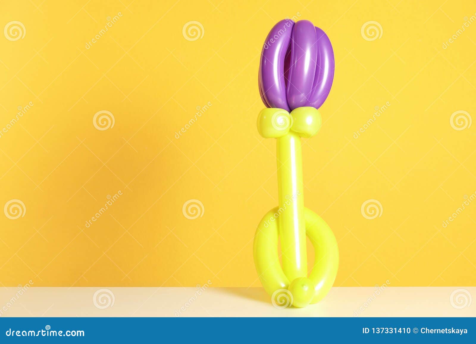 Flower Figure Made Of Modelling Balloon On Color Background Royalty ...